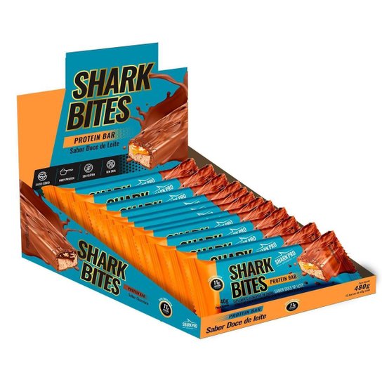 Barra De Proteína Shark Bites Sabor Doce De Leite 12 Unidades De 40g ...